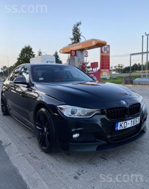 Black BMW 320 2012 in Riga, with an engine capacity of 2.00 L and mileage of 214 thousand km for 13400 €, photo 1 on AUTOMOTO.COM.LV