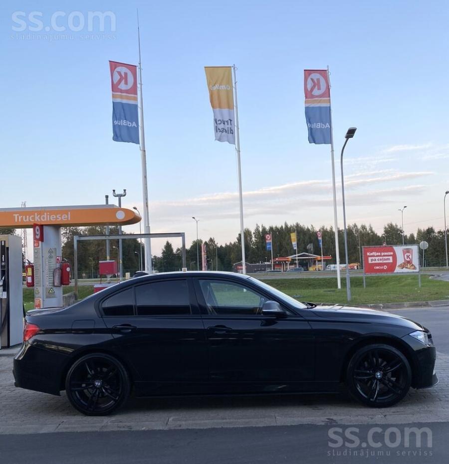 Black BMW 320 2012 in Riga, with an engine capacity of 2.00 L and mileage of 214 thousand km for 13400 €, photo 6 on AUTOMOTO.COM.LV