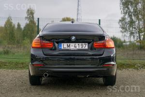 Black BMW 320 2012 in Riga, with an engine capacity of 2.00 L and mileage of 352 thousand km for 10990 €, photo 5 on AUTOMOTO.COM.LV