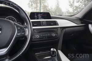 Black BMW 320 2012 in Riga, with an engine capacity of 2.00 L and mileage of 352 thousand km for 10990 €, photo 18 on AUTOMOTO.COM.LV