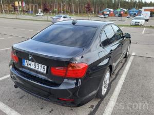 Black BMW 320 2012 in Riga, with an engine capacity of 2.00 L and mileage of 204 thousand km for 7700 €, photo 3 on AUTOMOTO.COM.LV