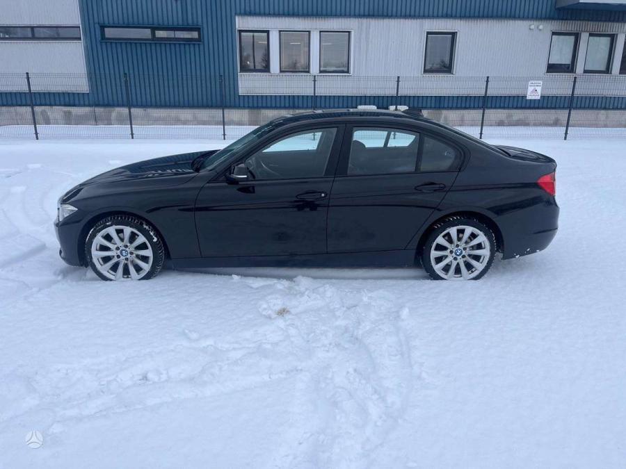 Black BMW 320 2012 in Kaunas, with an engine capacity of 2.00 L and mileage of 242 thousand km for 8500 €, photo 4 on AUTOMOTO.COM.LV