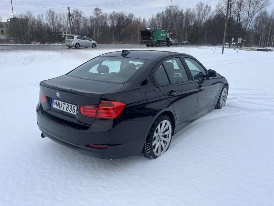 Black BMW 320 2012 in Kaunas, with an engine capacity of 2.00 L and mileage of 242 thousand km for 8500 €, photo 6 on AUTOMOTO.COM.LV