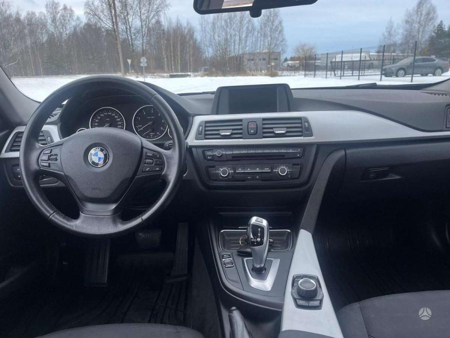 Black BMW 320 2012 in Kaunas, with an engine capacity of 2.00 L and mileage of 242 thousand km for 8500 €, photo 10 on AUTOMOTO.COM.LV