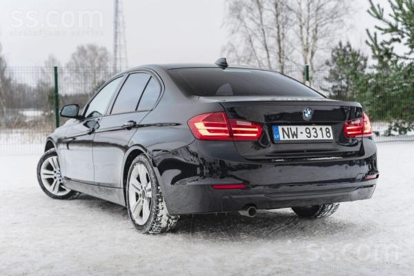 Black BMW 320 2012 in Riga, with an engine capacity of 2.00 L and mileage of 205 thousand km for 9490 €, photo 4 on AUTOMOTO.COM.LV