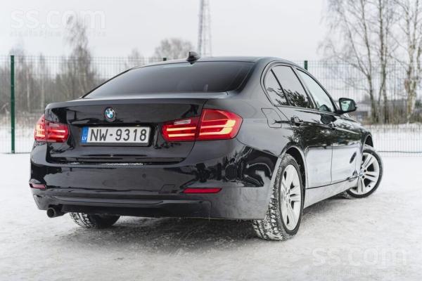 Black BMW 320 2012 in Riga, with an engine capacity of 2.00 L and mileage of 205 thousand km for 9490 €, photo 6 on AUTOMOTO.COM.LV