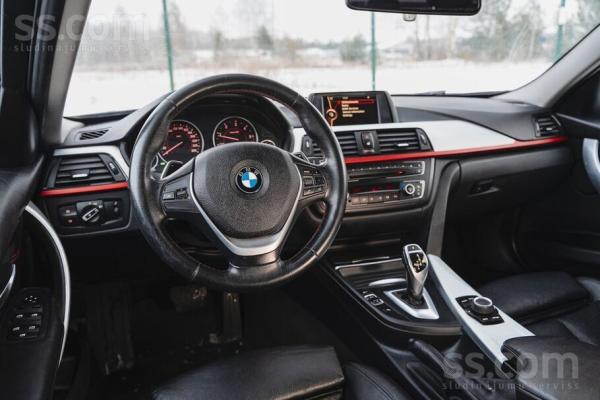 Black BMW 320 2012 in Riga, with an engine capacity of 2.00 L and mileage of 205 thousand km for 9490 €, photo 7 on AUTOMOTO.COM.LV