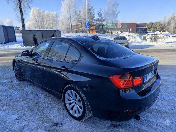 Black BMW 320 2012 in Vilnius, with an engine capacity of 2.00 L and mileage of 312 thousand km for 8500 €, photo 7 on AUTOMOTO.COM.LV