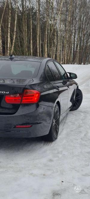 Black BMW 320 2012 in Vilnius, with an engine capacity of 2.00 L and mileage of 295 thousand km for 8700 €, photo 8 on AUTOMOTO.COM.LV