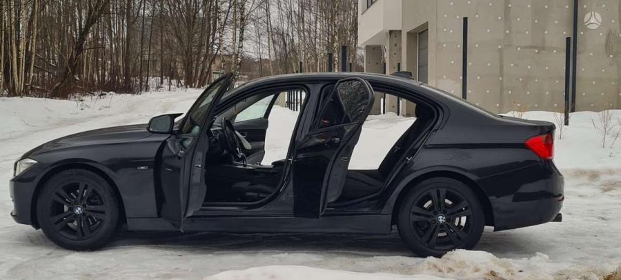Black BMW 320 2012 in Vilnius, with an engine capacity of 2.00 L and mileage of 295 thousand km for 8700 €, photo 14 on AUTOMOTO.COM.LV