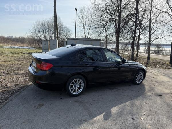 Black BMW 320 2012 in Riga, with an engine capacity of 2.00 L and mileage of 160 thousand km for 7500 €, photo 3 on AUTOMOTO.COM.LV