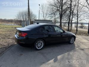 Black BMW 320 2012 in Riga, with an engine capacity of 2.00 L and mileage of 160 thousand km for 7500 €, photo 3 on AUTOMOTO.COM.LV