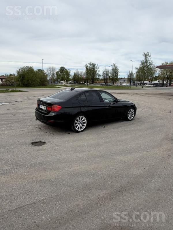 Black BMW 320 2012 in Ogre, with an engine capacity of 2.00 L and mileage of 430 thousand km for 6890 €, photo 5 on AUTOMOTO.COM.LV