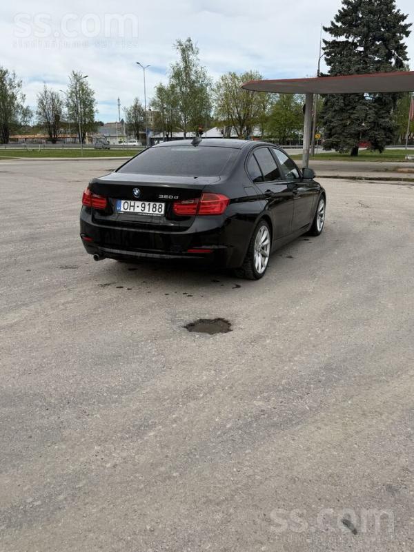 Black BMW 320 2012 in Ogre, with an engine capacity of 2.00 L and mileage of 430 thousand km for 6890 €, photo 6 on AUTOMOTO.COM.LV