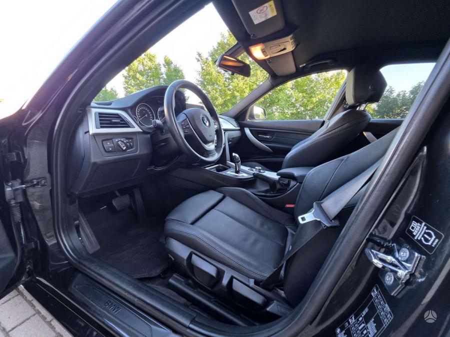 Black BMW 320 2012 in Vilnius, with an engine capacity of 2.00 L and mileage of 188 thousand km for 7500 €, photo 12 on AUTOMOTO.COM.LV