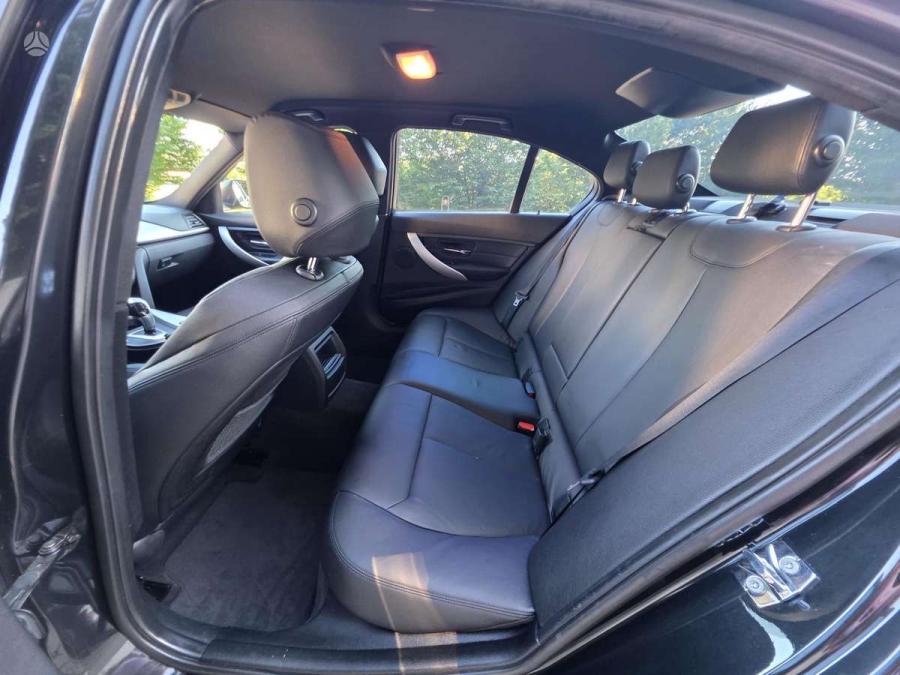 Black BMW 320 2012 in Vilnius, with an engine capacity of 2.00 L and mileage of 188 thousand km for 7500 €, photo 13 on AUTOMOTO.COM.LV
