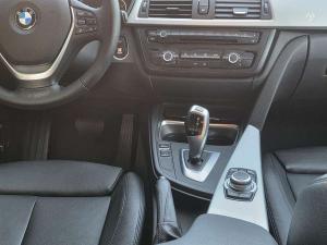 Black BMW 320 2012 in Vilnius, with an engine capacity of 2.00 L and mileage of 188 thousand km for 7500 €, photo 16 on AUTOMOTO.COM.LV
