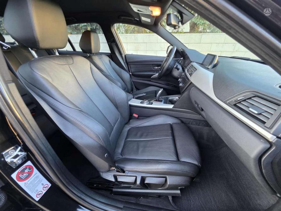 Black BMW 320 2012 in Vilnius, with an engine capacity of 2.00 L and mileage of 188 thousand km for 7500 €, photo 22 on AUTOMOTO.COM.LV