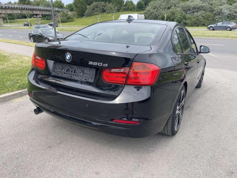 Black BMW 320 2012 in Kaunas, with an engine capacity of 2.00 L and mileage of 278 thousand km for 6850 €, photo 14 on AUTOMOTO.COM.LV