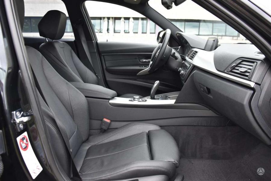 Black BMW 320 2012 in Vilnius, with an engine capacity of 2.00 L and mileage of 189 thousand km for 7500 €, photo 13 on AUTOMOTO.COM.LV