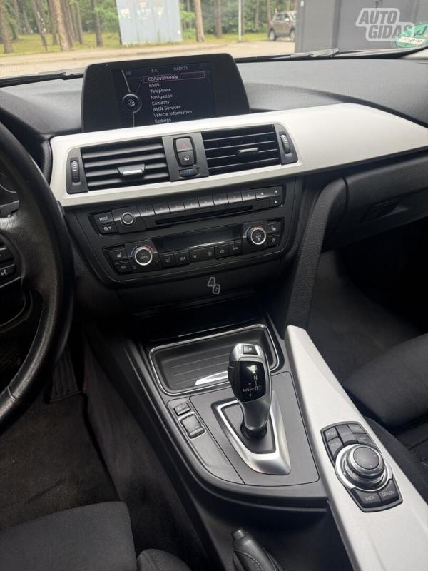 Black BMW 320 2012 in Alytus, with an engine capacity of 2.00 L and mileage of 219 thousand km for 6950 €, photo 8 on AUTOMOTO.COM.LV