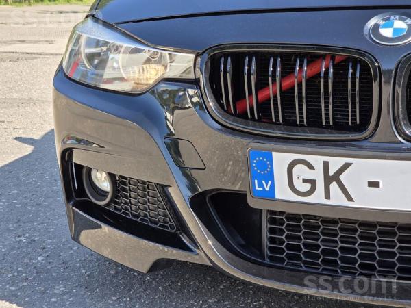 Black BMW 320 2012 in Riga, with an engine capacity of 2.00 L and mileage of 236 thousand km for 7950 €, photo 5 on AUTOMOTO.COM.LV