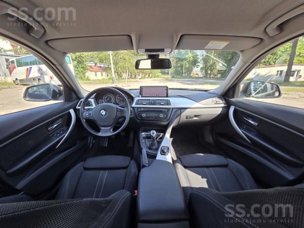 Black BMW 320 2012 in Riga, with an engine capacity of 2.00 L and mileage of 236 thousand km for 7950 €, photo 6 on AUTOMOTO.COM.LV
