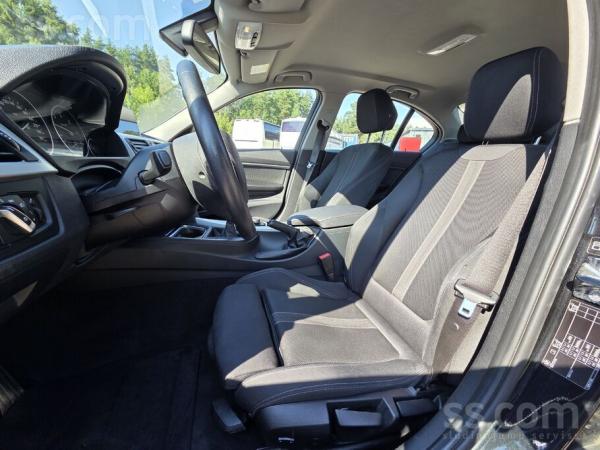Black BMW 320 2012 in Riga, with an engine capacity of 2.00 L and mileage of 236 thousand km for 7950 €, photo 9 on AUTOMOTO.COM.LV
