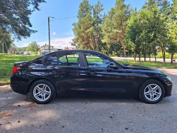 Black BMW 320 2012 in Vilnius, with an engine capacity of 2.00 L and mileage of 221 thousand km for 7900 €, photo 6 on AUTOMOTO.COM.LV