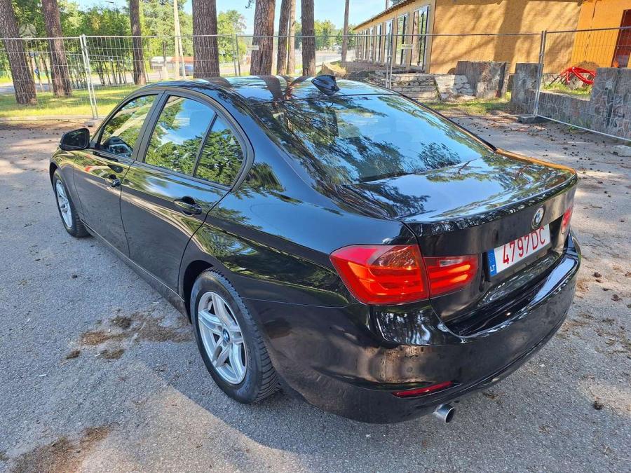 Black BMW 320 2012 in Vilnius, with an engine capacity of 2.00 L and mileage of 221 thousand km for 7900 €, photo 12 on AUTOMOTO.COM.LV