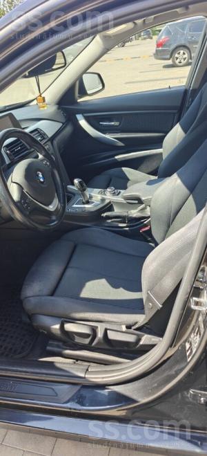 Black BMW 320 2012 in Riga, with an engine capacity of 2.00 L and mileage of 191 thousand km for 10000 €, photo 11 on AUTOMOTO.COM.LV