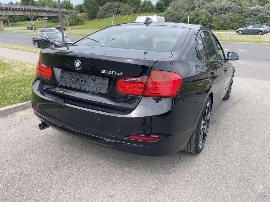 Black BMW 320 2012 in Kaunas, with an engine capacity of 2.00 L and mileage of 279 thousand km for 5650 €, photo 12 on AUTOMOTO.COM.LV