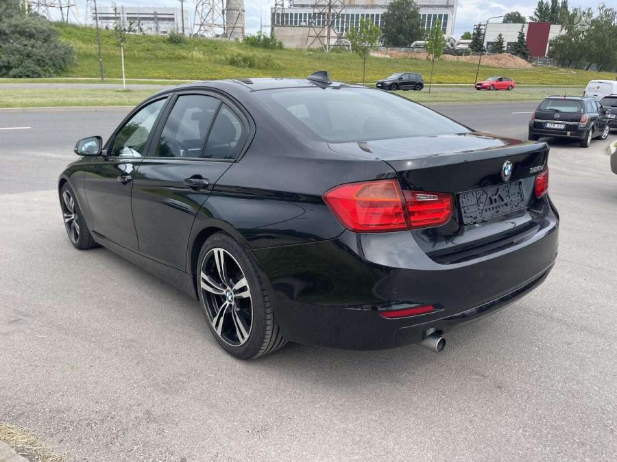 Black BMW 320 2012 in Kaunas, with an engine capacity of 2.00 L and mileage of 279 thousand km for 5650 €, photo 14 on AUTOMOTO.COM.LV