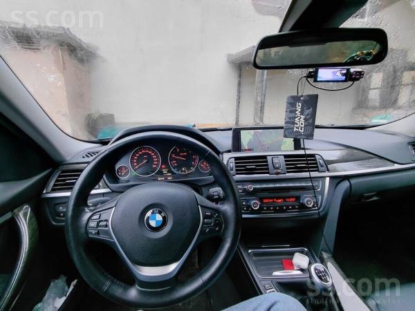 Black BMW 320 2012 in Saldus, with an engine capacity of 2.00 L and mileage of 238 thousand km for 7500 €, photo 3 on AUTOMOTO.COM.LV