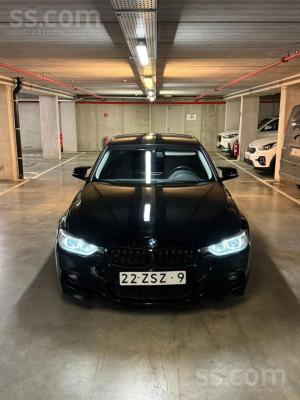 Black BMW 320 2013 in Riga, with an engine capacity of 1.60 L and mileage of 245 thousand km for 11900 €, photo 2 on AUTOMOTO.COM.LV