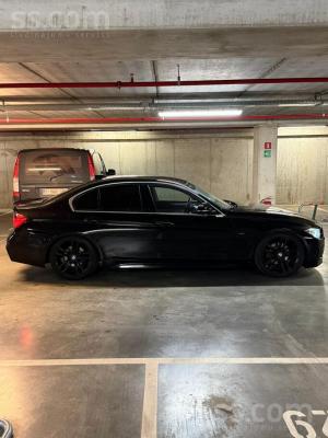 Black BMW 320 2013 in Riga, with an engine capacity of 1.60 L and mileage of 245 thousand km for 11900 €, photo 7 on AUTOMOTO.COM.LV