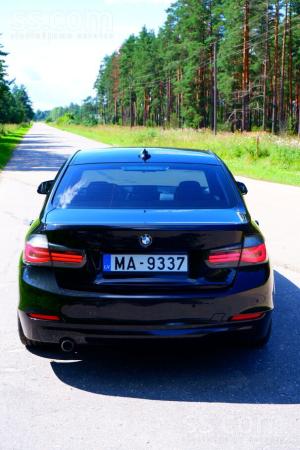 Black BMW 320 2013 in Riga, with an engine capacity of 2.00 L and mileage of 230 thousand km for 10800 €, photo 6 on AUTOMOTO.COM.LV