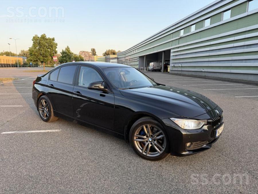 Black BMW 320 2013 in Riga, with an engine capacity of 2.00 L and mileage of 127 thousand km for 13990 €, photo 1 on AUTOMOTO.COM.LV