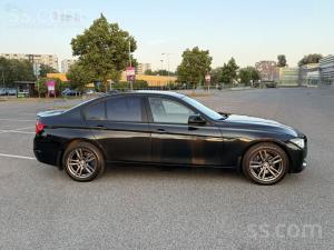 Black BMW 320 2013 in Riga, with an engine capacity of 2.00 L and mileage of 127 thousand km for 13990 €, photo 7 on AUTOMOTO.COM.LV
