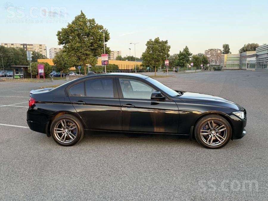 Black BMW 320 2013 in Riga, with an engine capacity of 2.00 L and mileage of 127 thousand km for 13990 €, photo 7 on AUTOMOTO.COM.LV