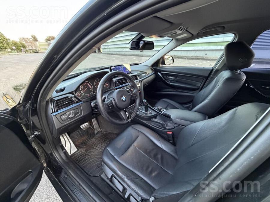 Black BMW 320 2013 in Riga, with an engine capacity of 2.00 L and mileage of 127 thousand km for 13990 €, photo 11 on AUTOMOTO.COM.LV