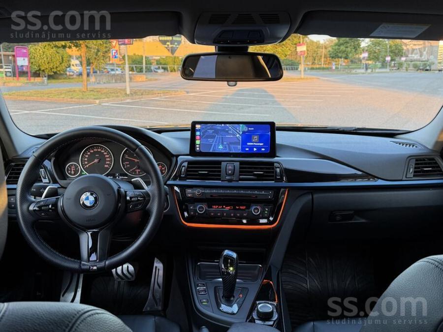 Black BMW 320 2013 in Riga, with an engine capacity of 2.00 L and mileage of 127 thousand km for 13990 €, photo 12 on AUTOMOTO.COM.LV