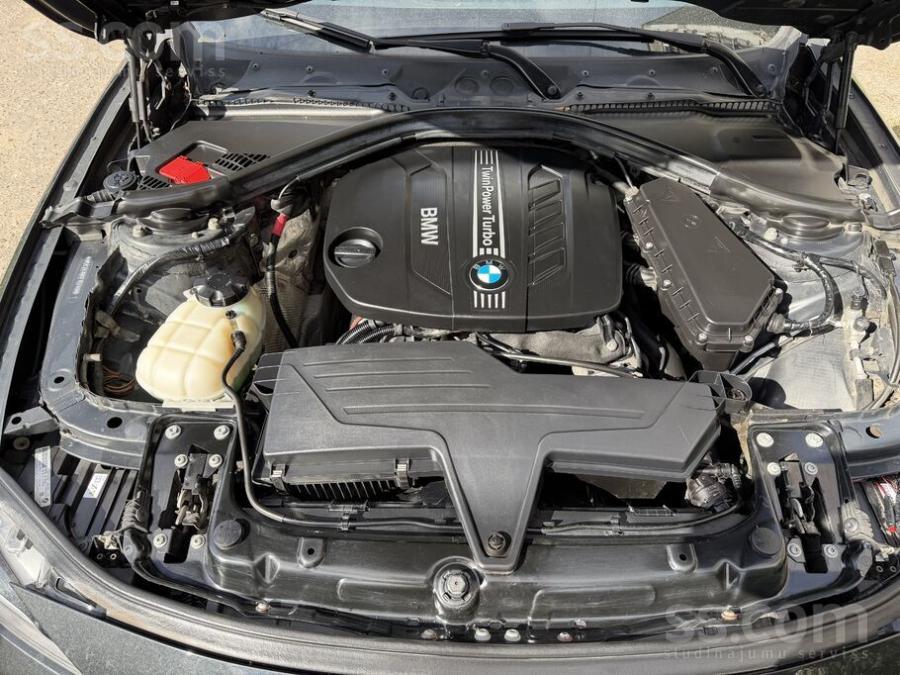Black BMW 320 2013 in Riga, with an engine capacity of 2.00 L and mileage of 127 thousand km for 13990 €, photo 23 on AUTOMOTO.COM.LV