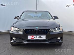 Black BMW 320 2013 in Riga, with an engine capacity of 2.00 L and mileage of 127 thousand km for 13950 €, photo 3 on AUTOMOTO.COM.LV