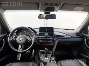 Black BMW 320 2013 in Riga, with an engine capacity of 2.00 L and mileage of 127 thousand km for 13950 €, photo 8 on AUTOMOTO.COM.LV