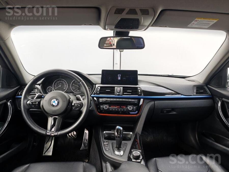 Black BMW 320 2013 in Riga, with an engine capacity of 2.00 L and mileage of 127 thousand km for 13950 €, photo 8 on AUTOMOTO.COM.LV