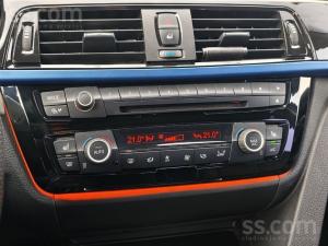 Black BMW 320 2013 in Riga, with an engine capacity of 2.00 L and mileage of 127 thousand km for 13950 €, photo 11 on AUTOMOTO.COM.LV