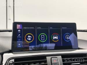 Black BMW 320 2013 in Riga, with an engine capacity of 2.00 L and mileage of 127 thousand km for 13950 €, photo 13 on AUTOMOTO.COM.LV