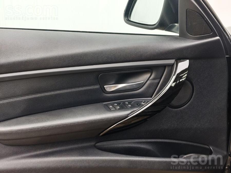 Black BMW 320 2013 in Riga, with an engine capacity of 2.00 L and mileage of 127 thousand km for 13950 €, photo 15 on AUTOMOTO.COM.LV