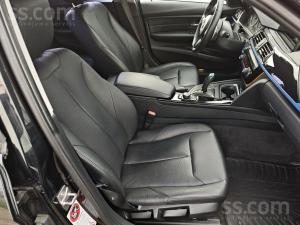 Black BMW 320 2013 in Riga, with an engine capacity of 2.00 L and mileage of 127 thousand km for 13950 €, photo 17 on AUTOMOTO.COM.LV